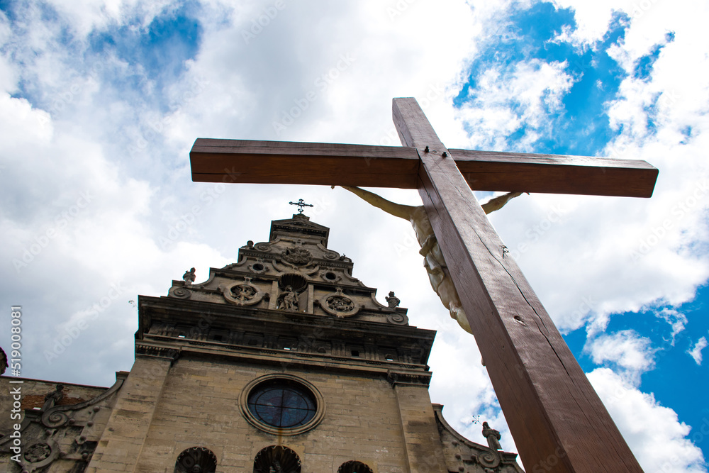 Lviv, Ukraine - July 10, 2022: Wooden cross in front of Bernardine ...