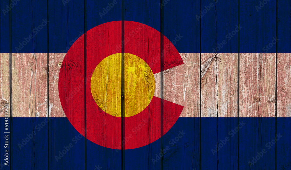 Top view of Old Painted Flag of Colorado state, USA on Dark Wooden ...