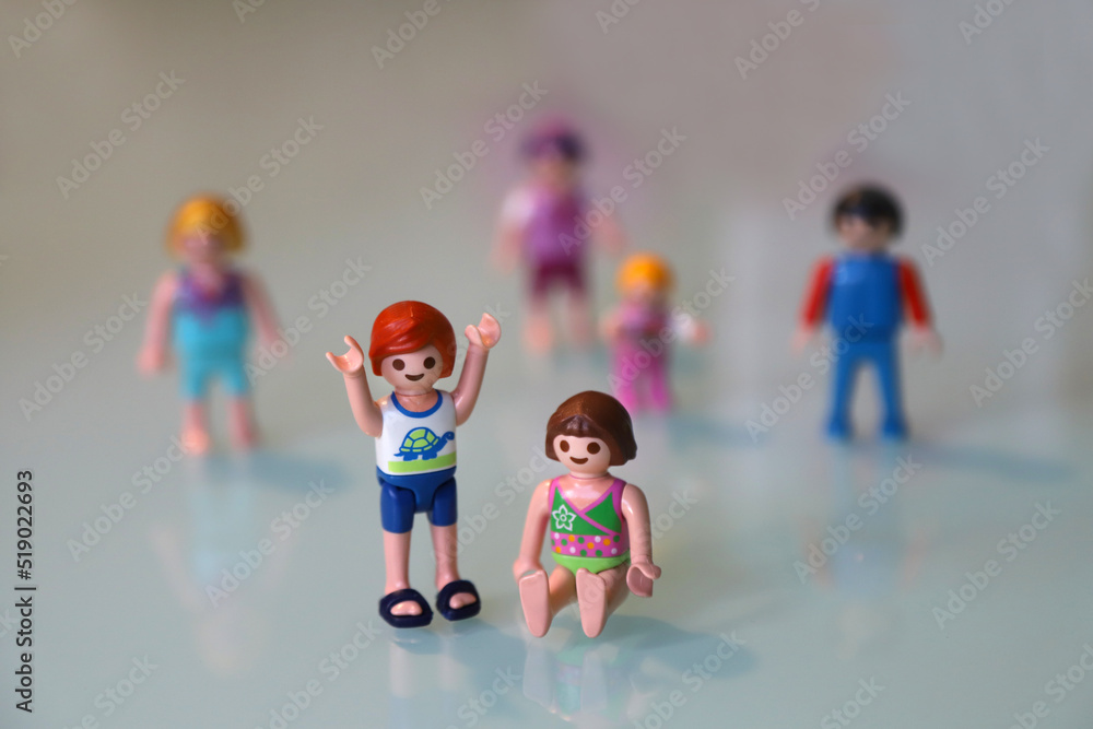 Playmobil figures. Toys for kids. Girl and boy in beachwear at the sea ...