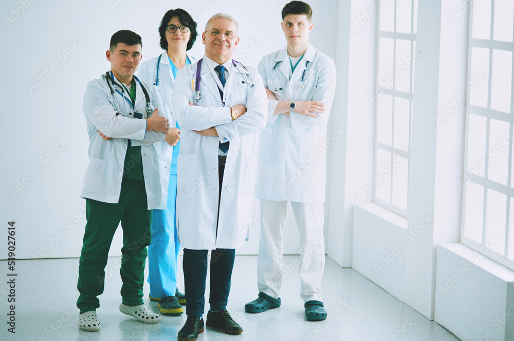 Successful medical team. Confident doctors team standing together and ...