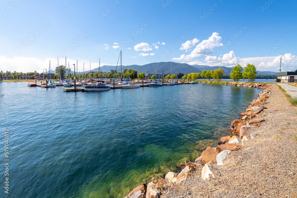 The marina and city beach area of downtown Sandpoint, Idaho, with boats ...