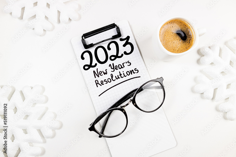 New year resolutions 2023 on desk. 2023 resolutions list with notebook ...