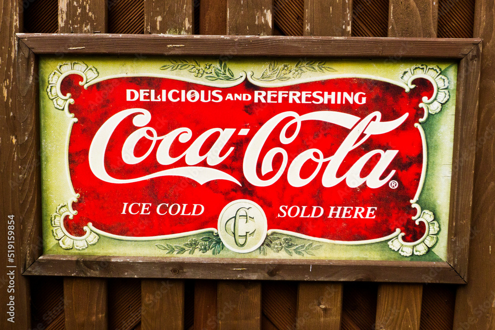 vintage Coca Cola logo on an advertising Stock Photo | Adobe Stock
