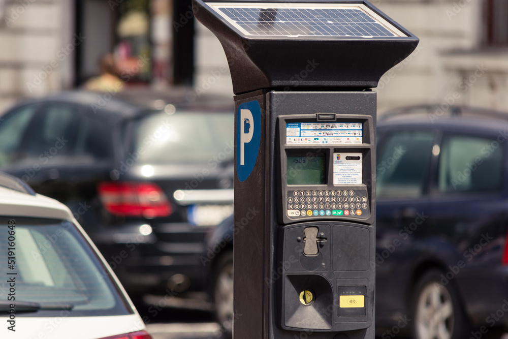 Parking meter with solar panel for renewable energy in parking lot with ...