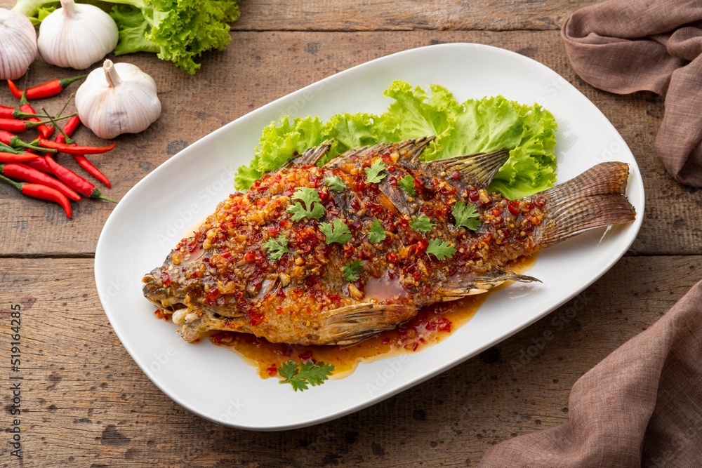 Three Flavoured Deep fried Fish,Fried fish with chili garlic and palm ...