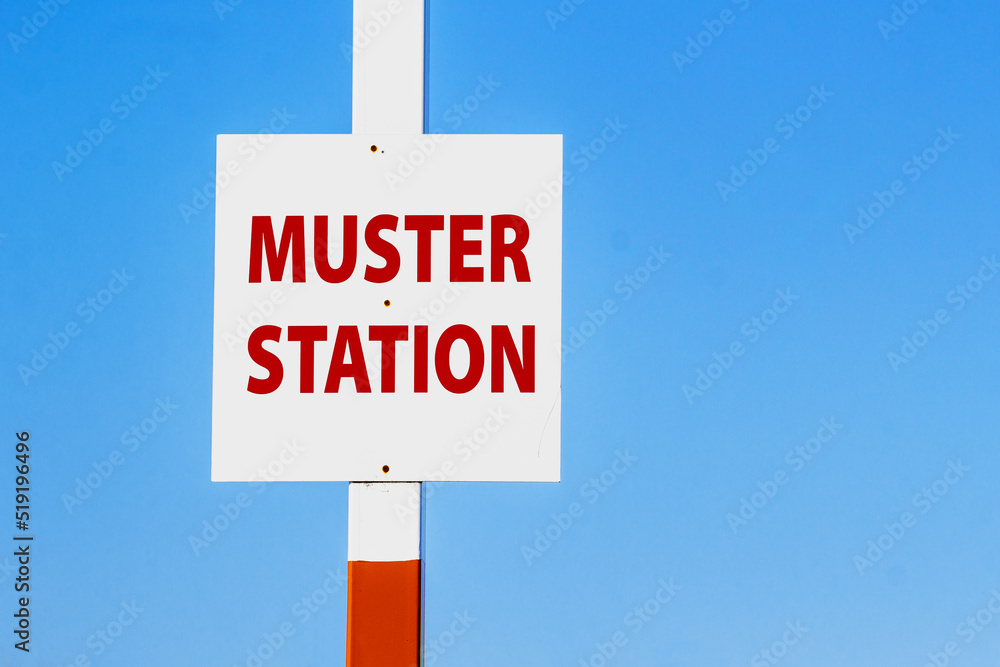 Muster station sign and blue sky with copy space Stock Photo | Adobe Stock