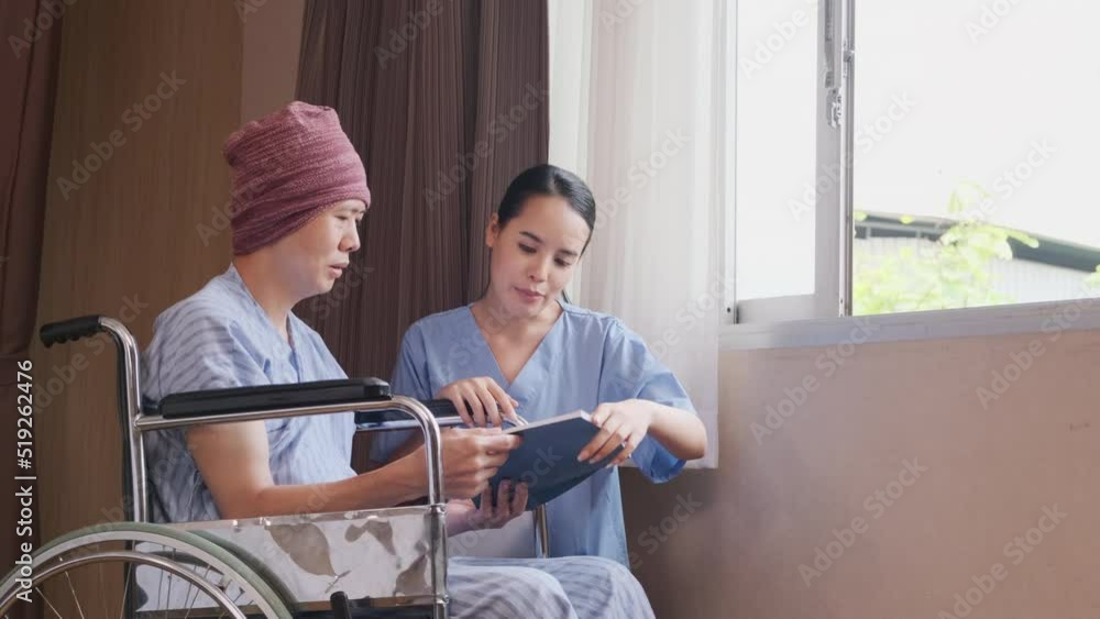 Uniformed young Asian female therapy doctor motivates wheelchair male ...