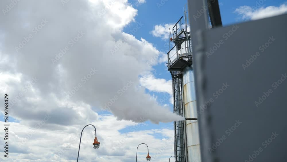 Chemical plant pipelines and water steam. Air pollution. Heavy industry ...