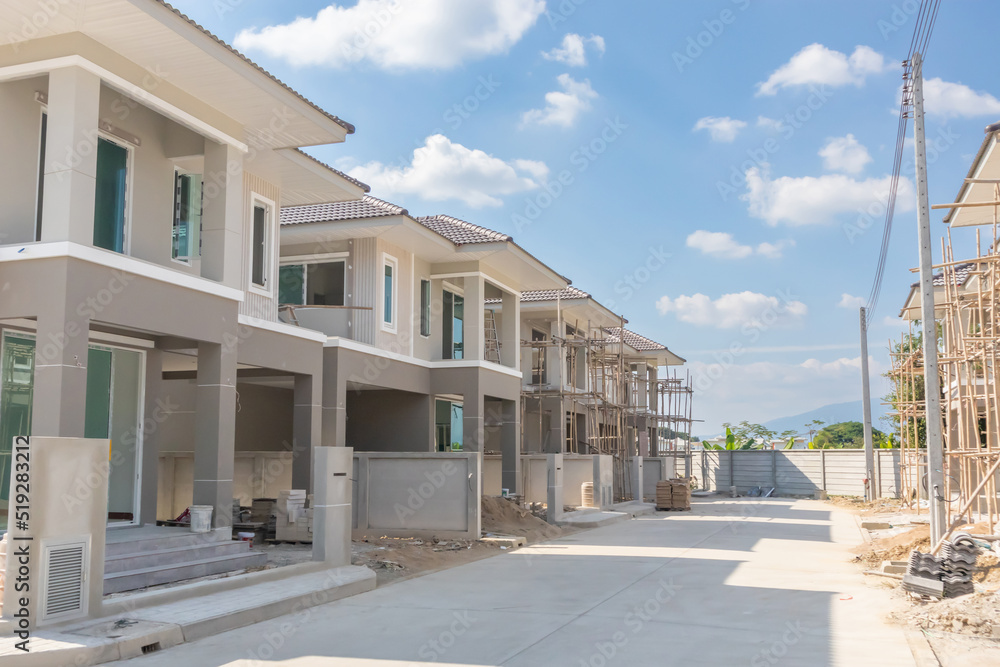construction residential new house in progress at building site housing ...