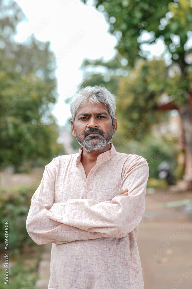 Poster Indian old man giving expression on nature background. – Wall ...