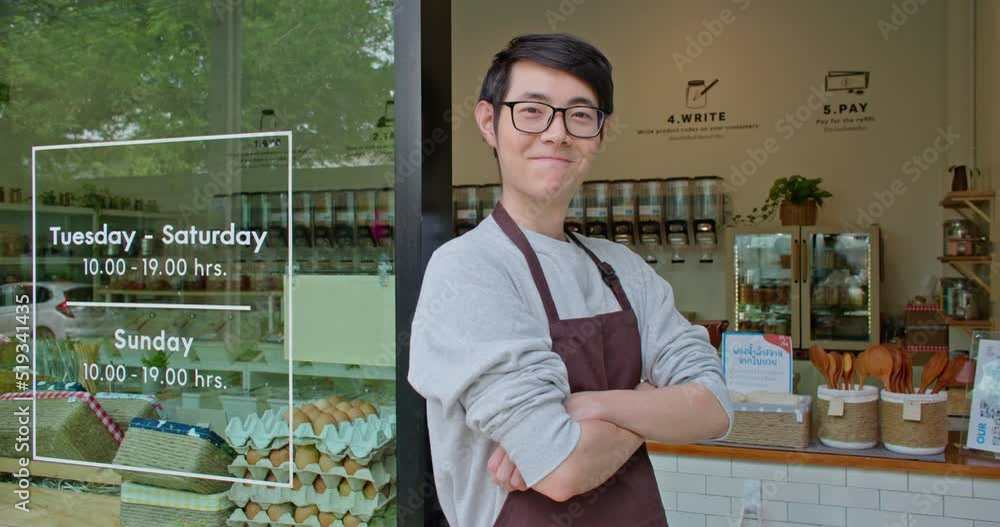 Portrait of happy asian man eco friendly shop owner smiling, looking at ...
