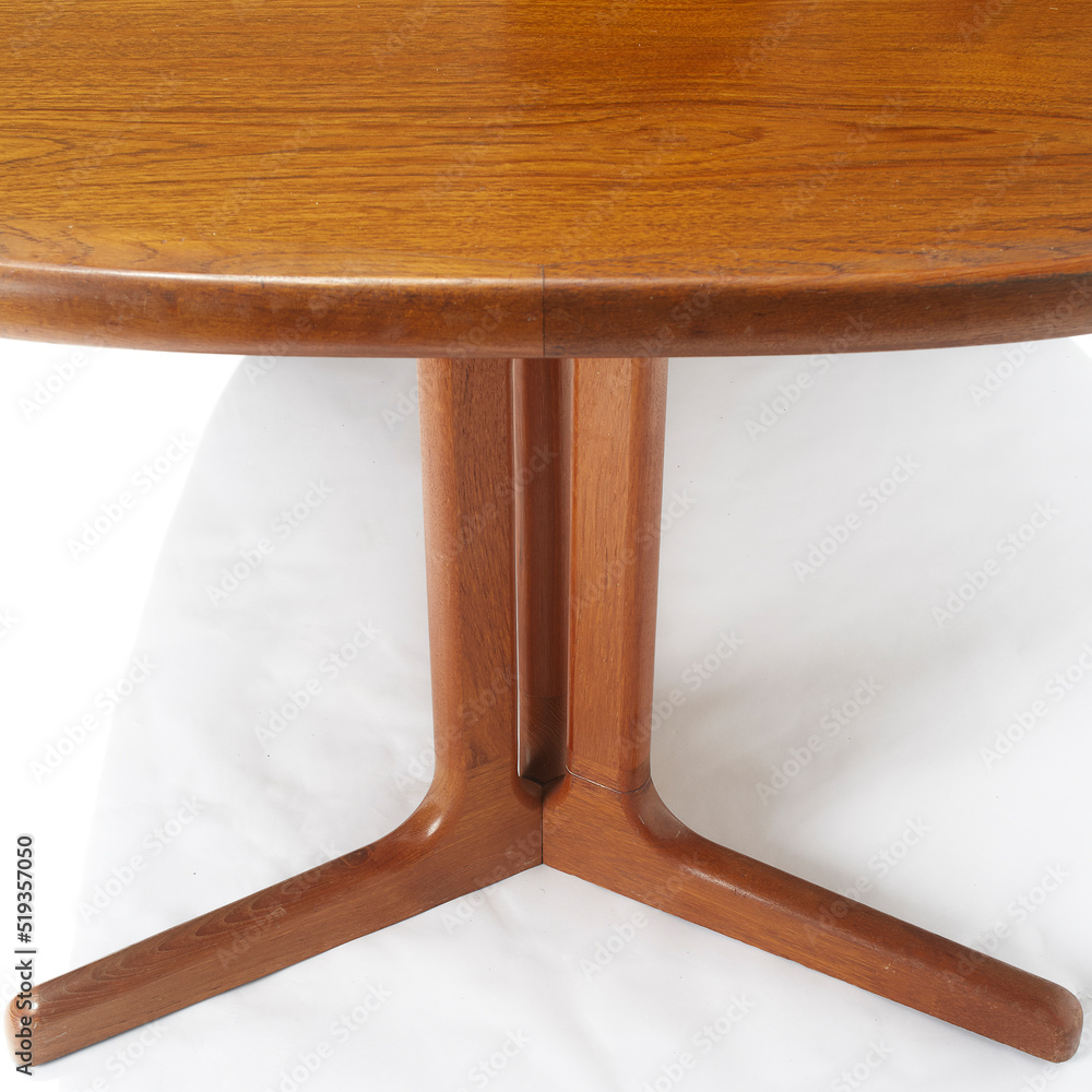 Mid-century modern wooden rounded corner table. Product photograph of ...