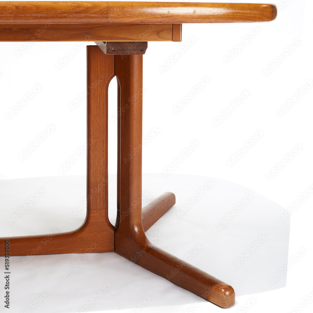 Mid-century modern wooden rounded corner table. Product photograph of ...