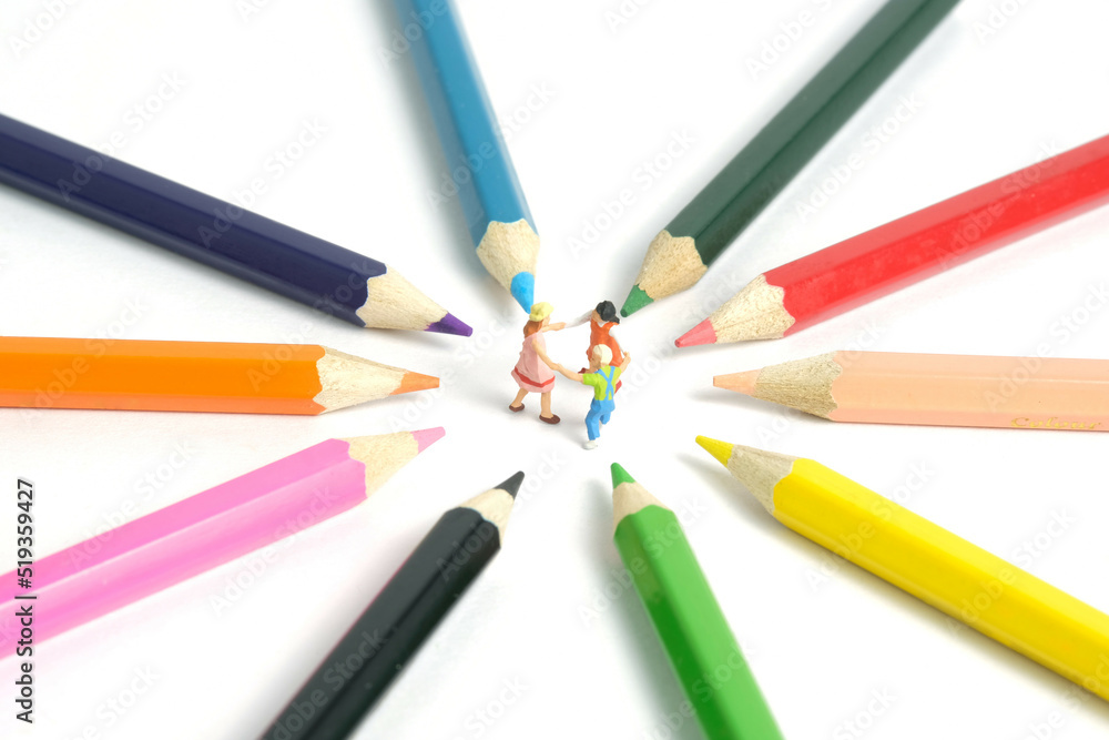 Miniature people toy figure photography. Drawing class concept. A group ...