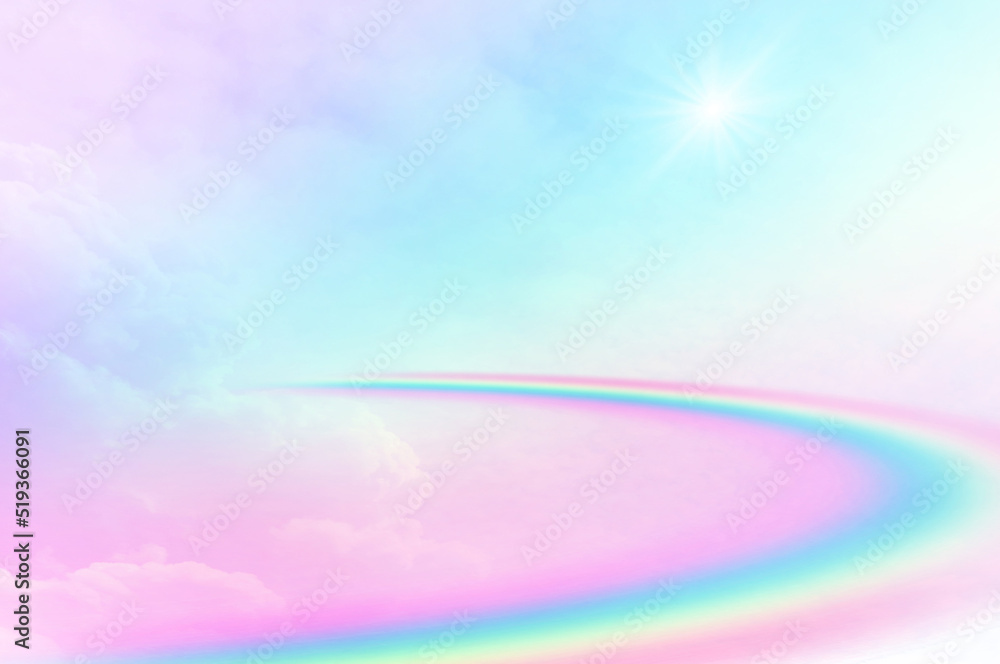 Colorful sky with soft white clouds and the crossing of rainbows ...