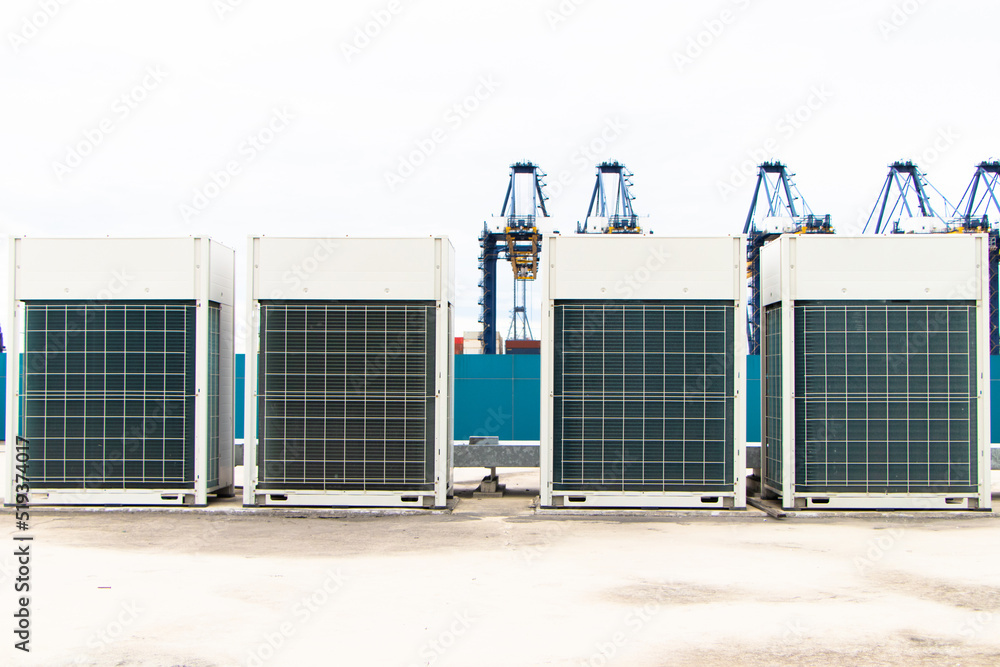 Big air conditioner compressor source heat pumps on wall outdoor on ...