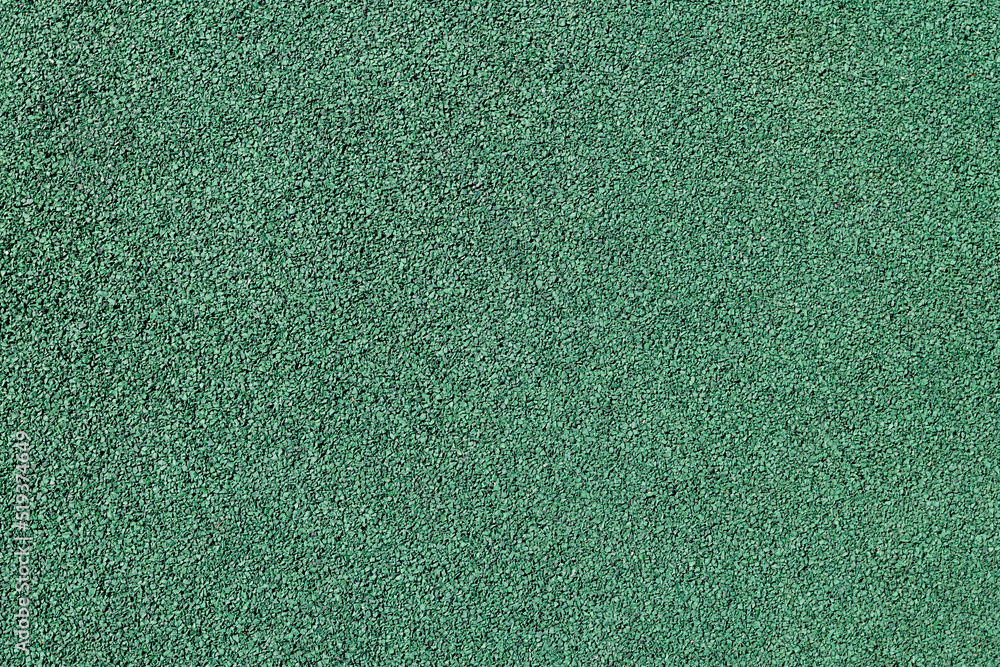 Sports covering from a rubber crumb of green color. View from above ...