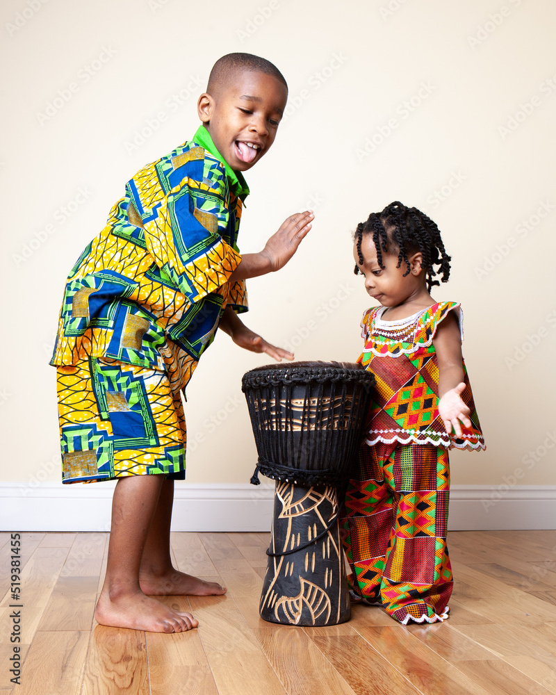 Traditional Ghanaian Fashion. Bright Kente fabrics from Ghana, West ...