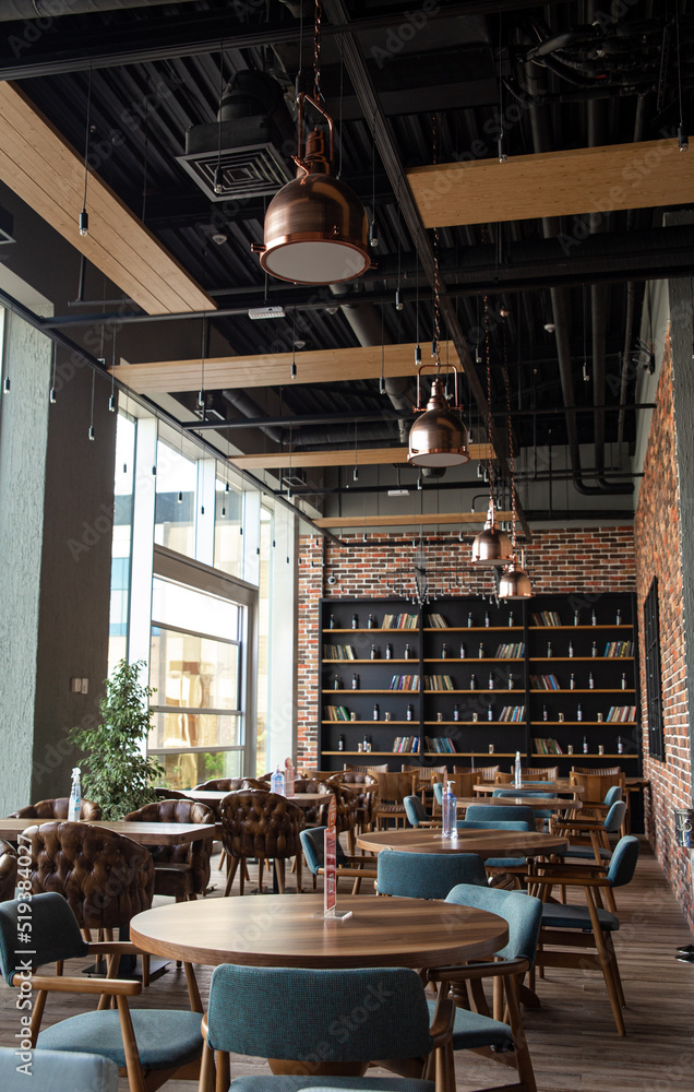 brick interior of the restaurant in the daytime Stock Photo | Adobe Stock