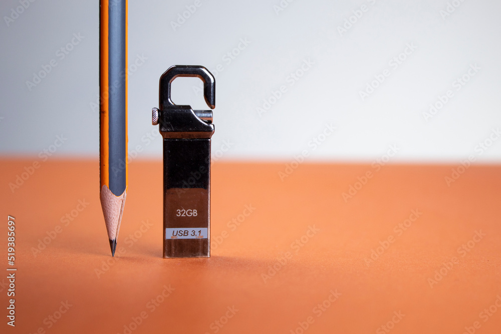 USB flash memory and pencil isolated. Concept of tasks in digital ...