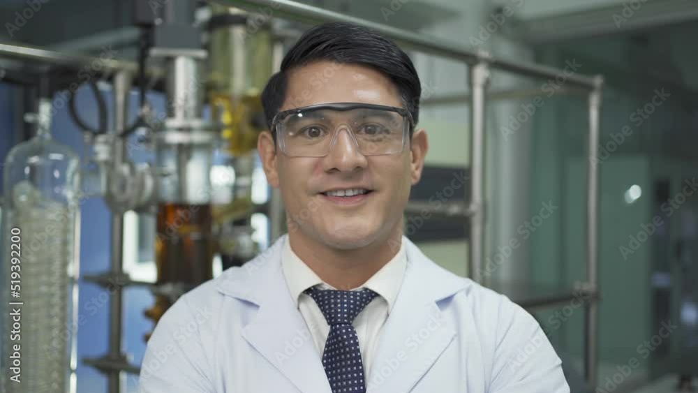A portrait of scientist man smiling in lab or laboratory in technology ...