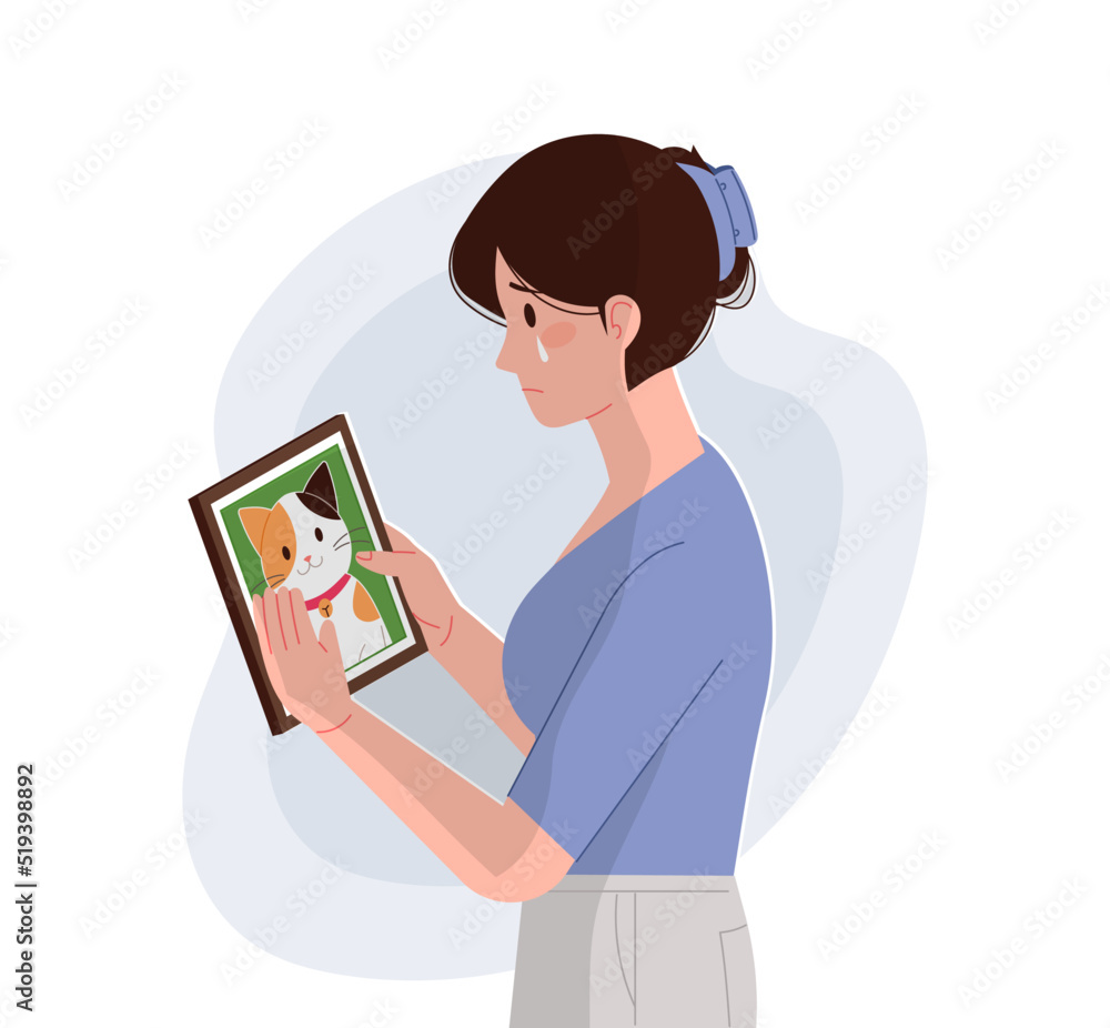 A woman who misses a cat that has passed away. Lost pet owner concept ...
