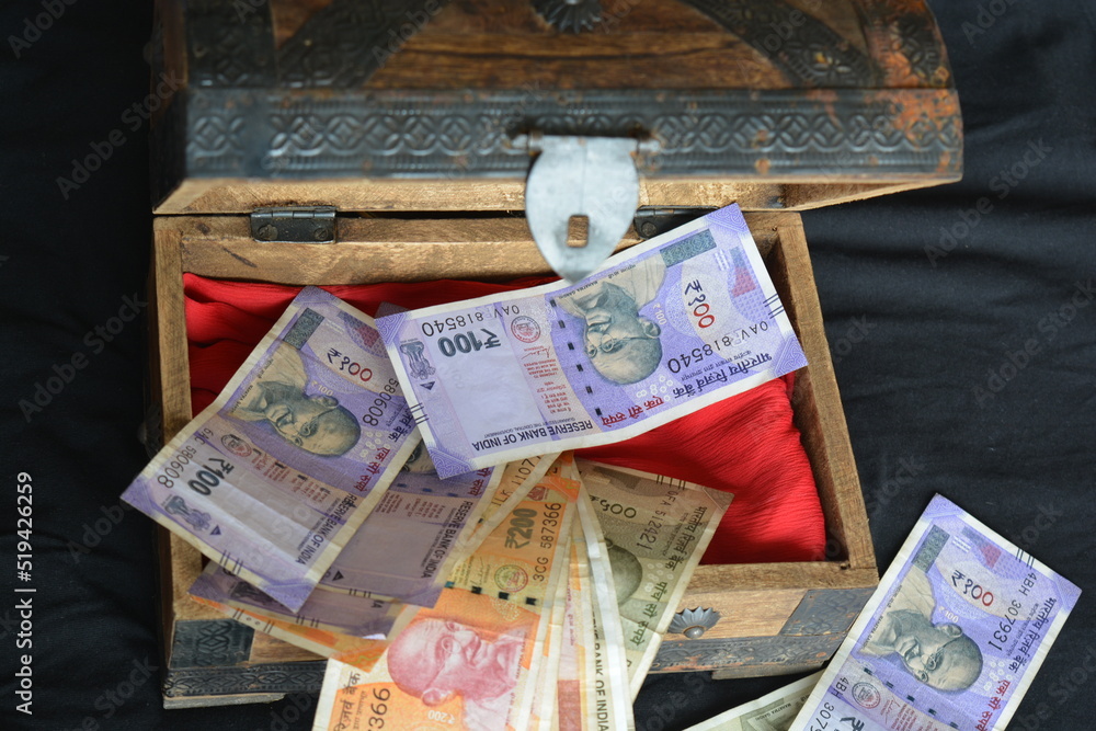 Indian currency notes in an antique chest Stock Photo | Adobe Stock