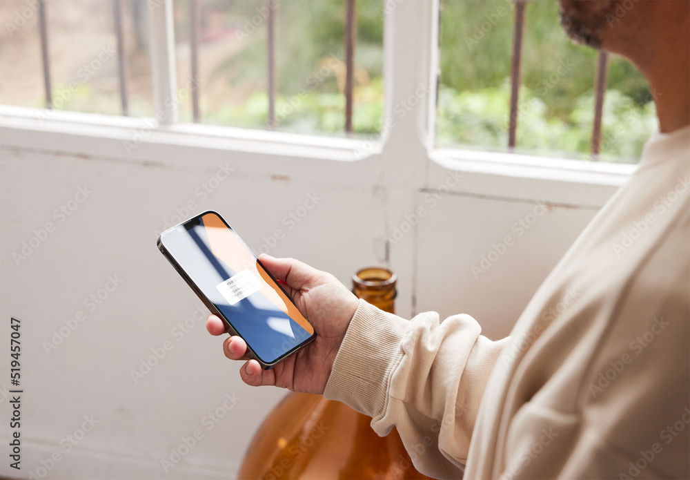 Man Using Smartphone Mockup with Natural Light Stock Template | Adobe Stock