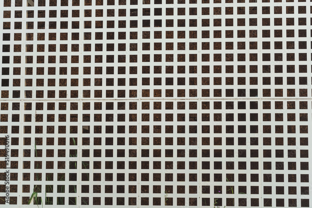 Texture of corrugated cladding metal. Iron texture with square cutouts ...