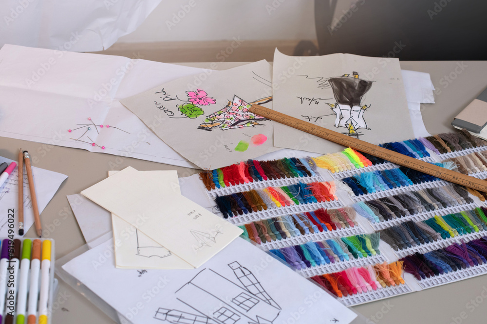 Work table of dress maker or fashion designer table, patterns for ...