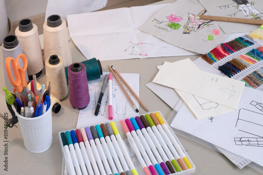 Work table of dress maker or fashion designer table, patterns for ...