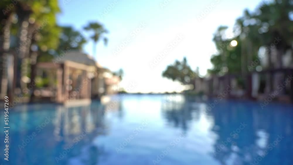 Blurry background swimming pool resort setting for composite work ...