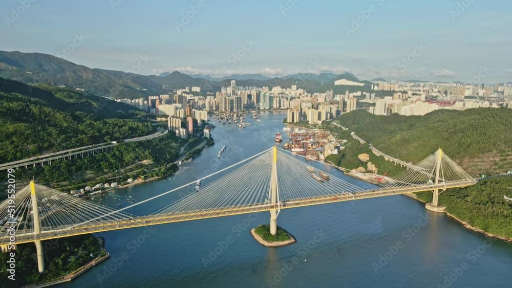 Tsuen Wan and traffic on Ting Kau Bridge in Hong Kong on golden hour ...