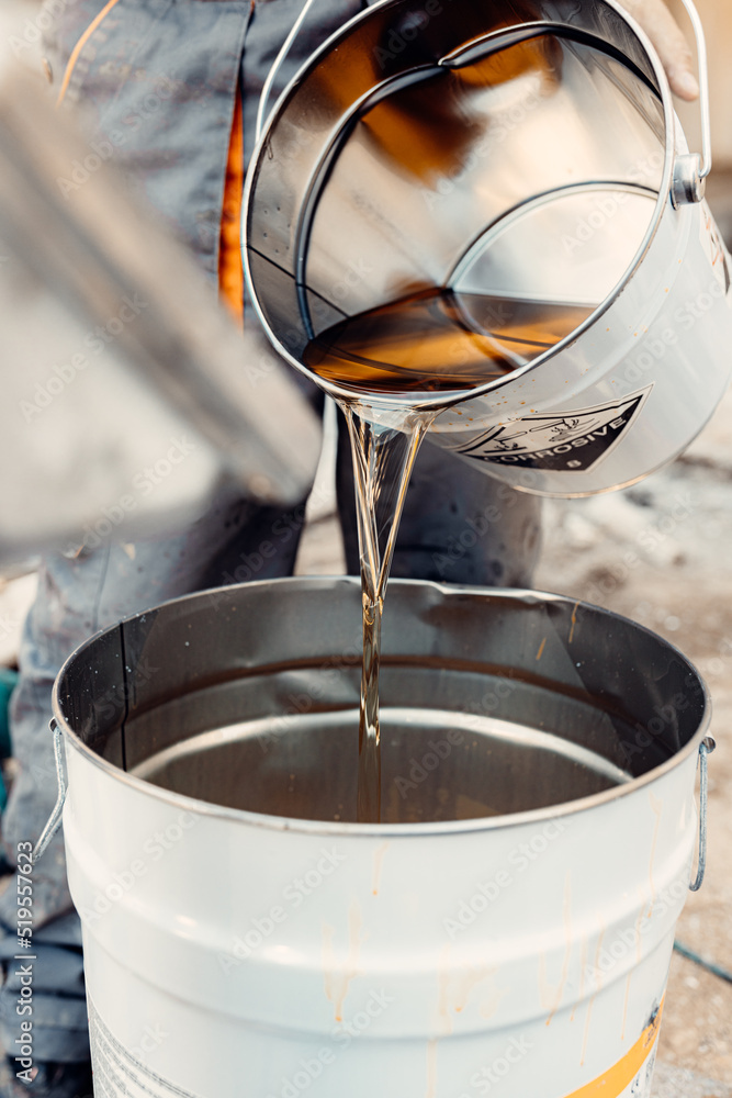 Mixture of yellow color with epoxy resin for industrial floors Stock ...