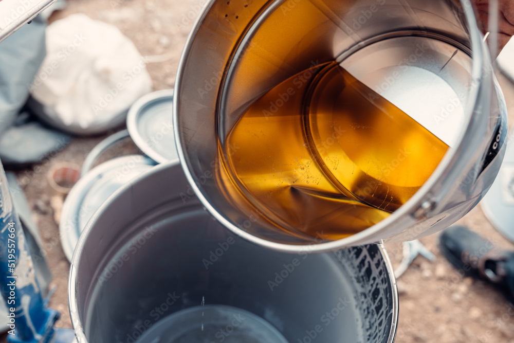 Mixture of yellow color with epoxy resin for industrial floors Stock ...