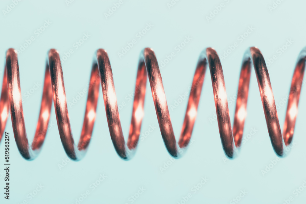 Beautiful macro close-up of twisted horizontal copper spring wire on a ...