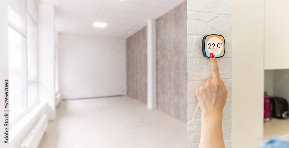 Thermostat smart home domotic control panel on wall for winter house ...