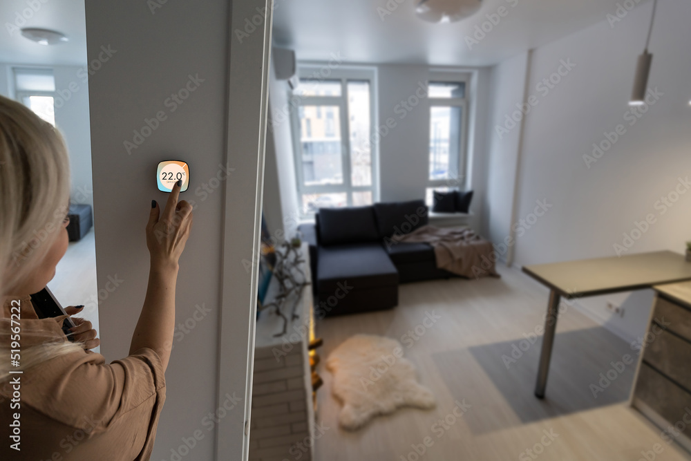 Thermostat smart home domotic control panel on wall for winter house ...