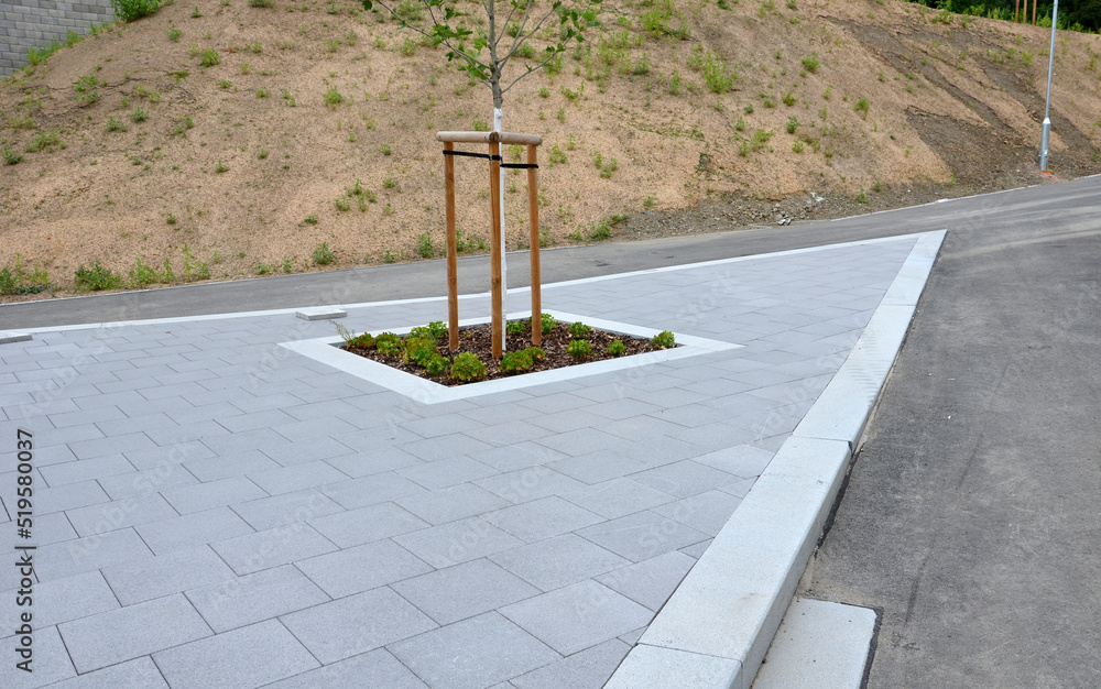 wide granite stone staircase looks representative. cobblestone tiles ...
