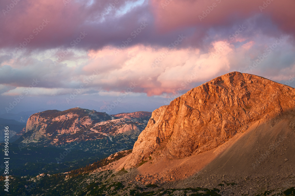 vivid and vibrant sunset scene in the austrian alps near Dachstein as ...