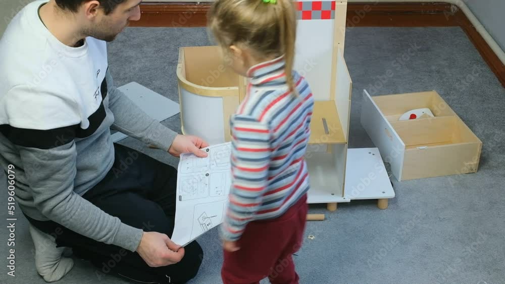 little daughter girl help father to Assembly Play Kraft Kitchens wood ...