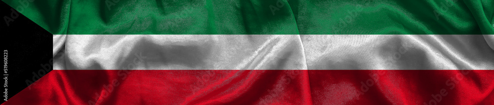 Elongated national flag of Kuwait with a fabric texture fluttering in ...