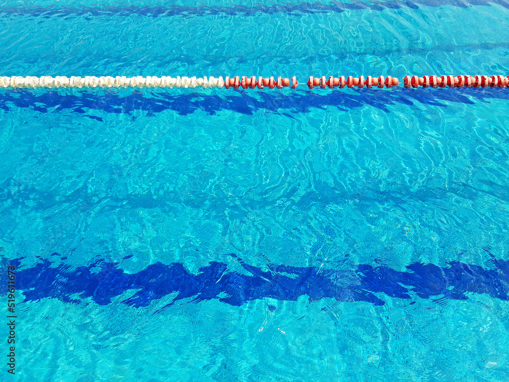 Olympic pool water background with parting lines. Swimming and water ...