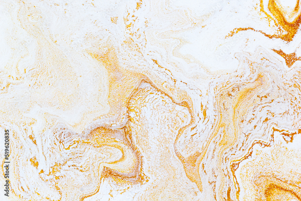 Gold liquid marble background. Used in design for skin tile ,wallpaper ...