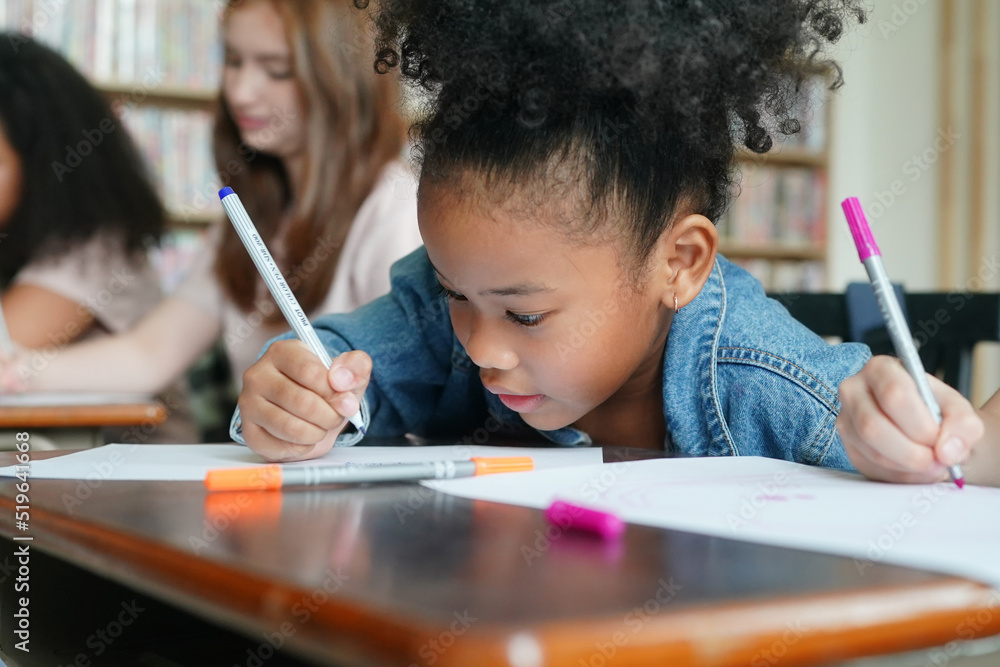 African kids drawing and do homework in classroom, young girl happy ...