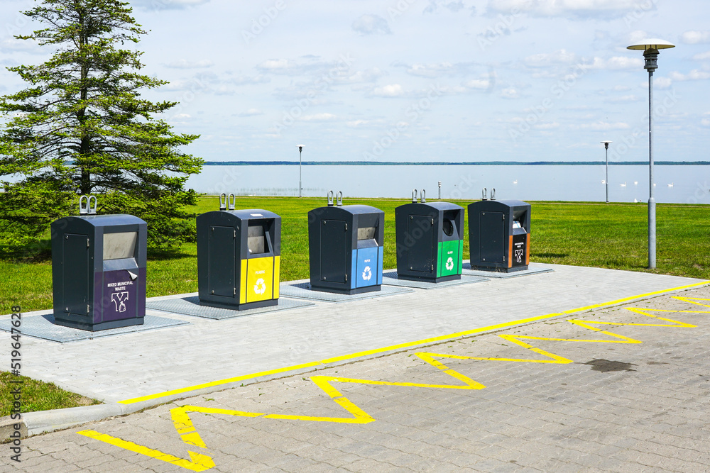 New containers for different waste sorting in the city square Stock ...