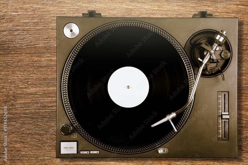 Classic and analog turntable for playing vinyl records. Model for a DJ ...