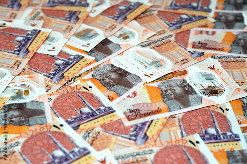 Pile of the new first Egyptian 10 LE EGP ten pounds plastic polymer ...