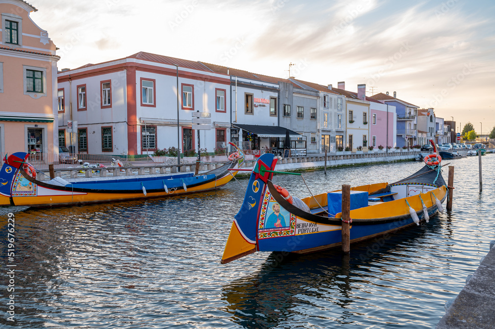 Traditional boats in the canal of Aveiro, Portugal. The colorful ...