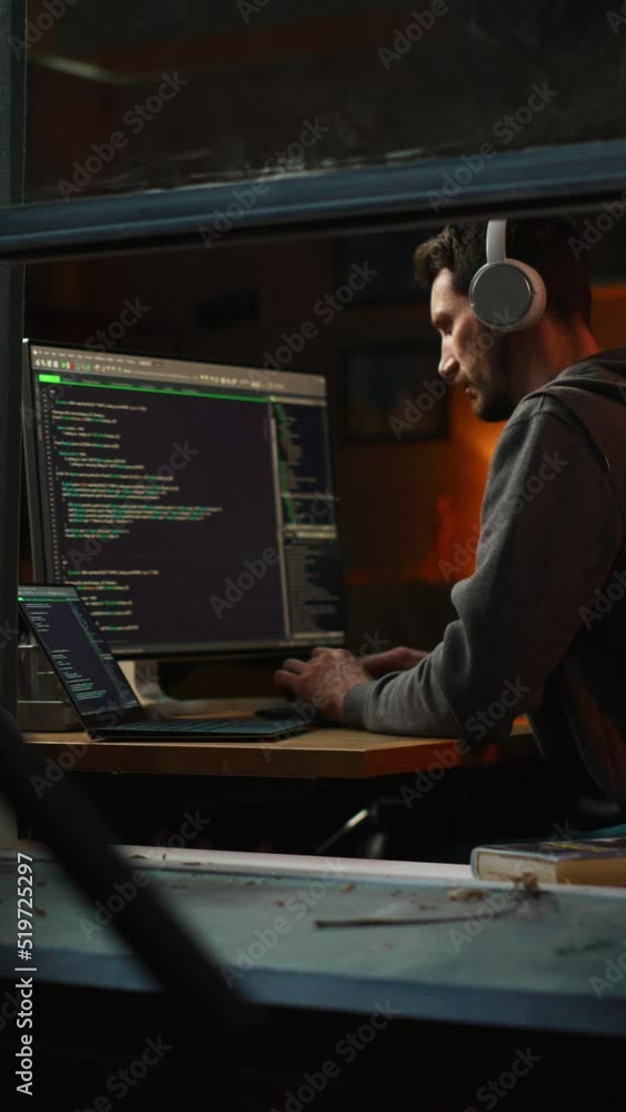 Vertical Screen: Caucasian Man Working on Laptop Computer while Sitting ...